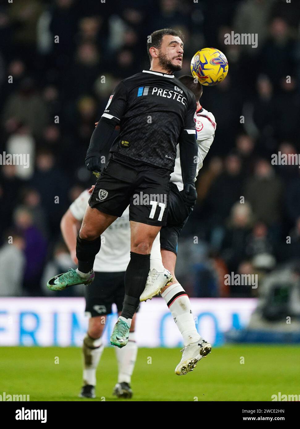 Burton Albion's Mason Bennett and Derby County's Conor Hourihane battle ...