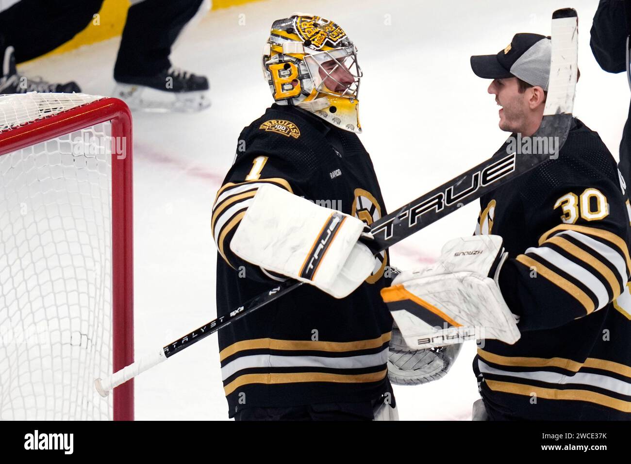 Boston Bruins goaltender Jeremy Swayman (1) is congratulated by goalie ...