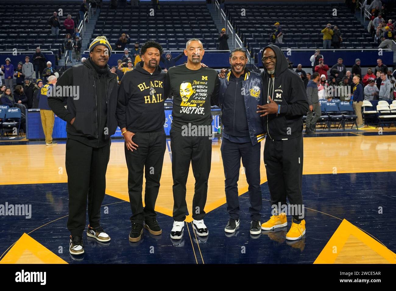 Former Michigan Fab Five basketball players Chris Webber, from left ...