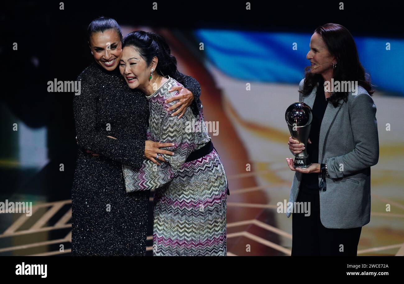 Former Brazilian player Marta (left) on stage after receiving a special ...