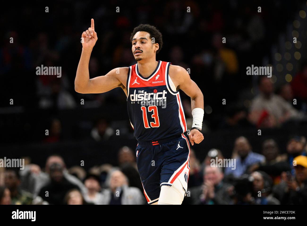 Washington Wizards guard Jordan Poole (13) gestures after he scored ...