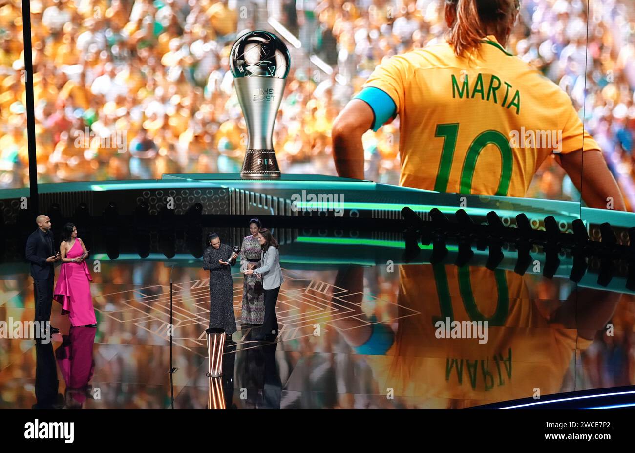 Former Brazilian player Marta (left) on stage after receiving a special ...