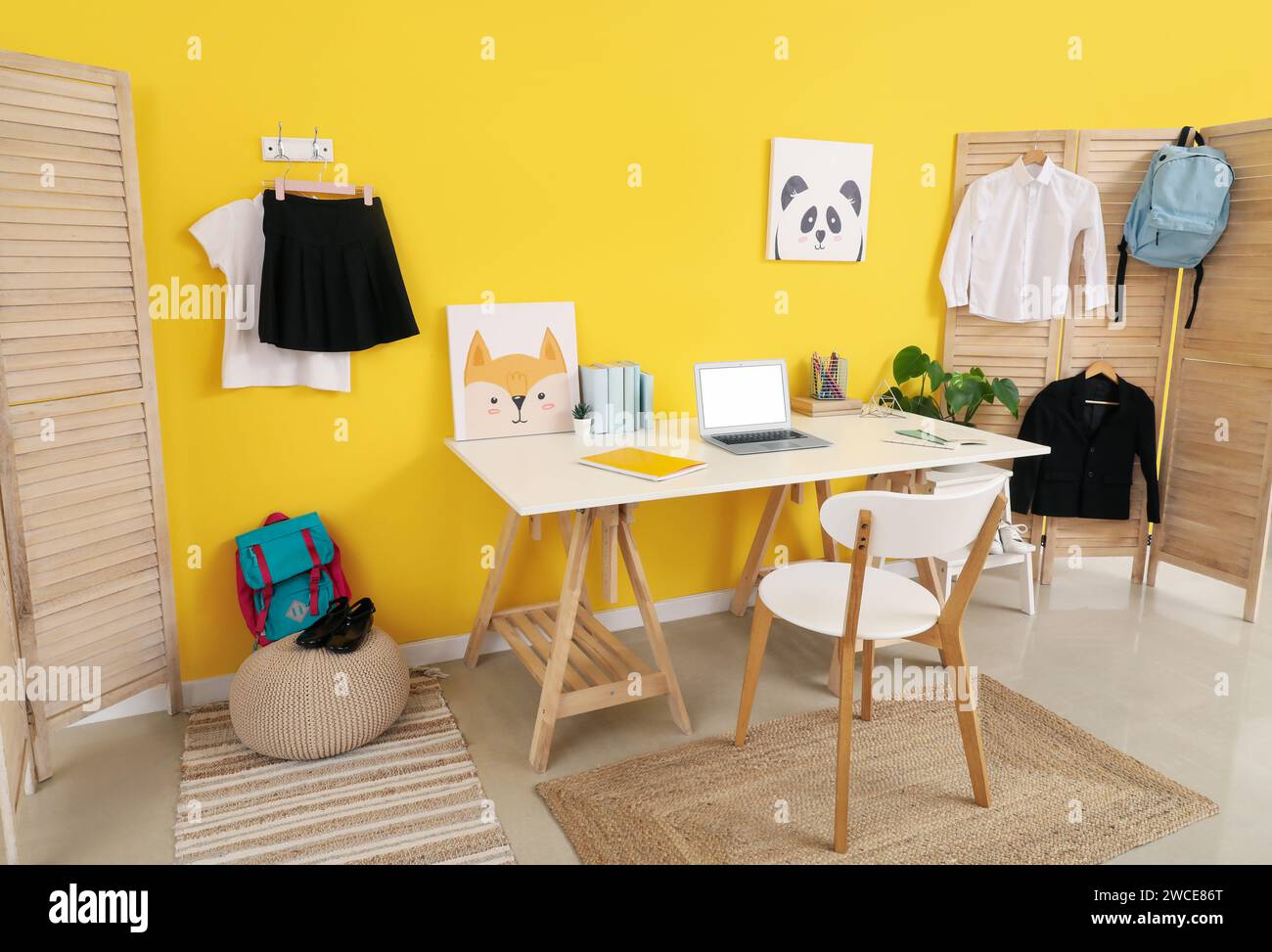 Interior of modern room with workplace and stylish school uniform Stock ...