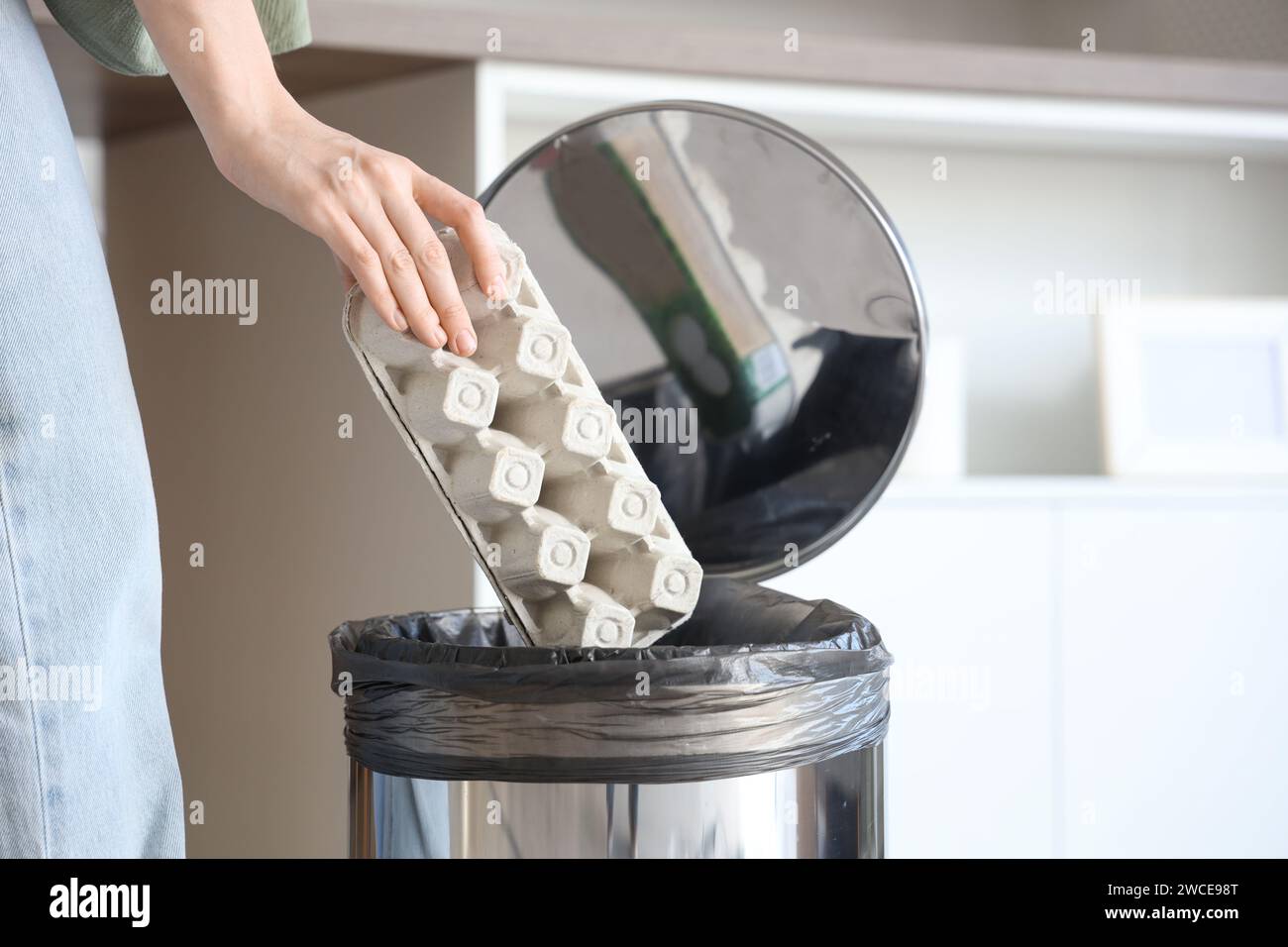 Woman throwing garbage trash box hi-res stock photography and images ...
