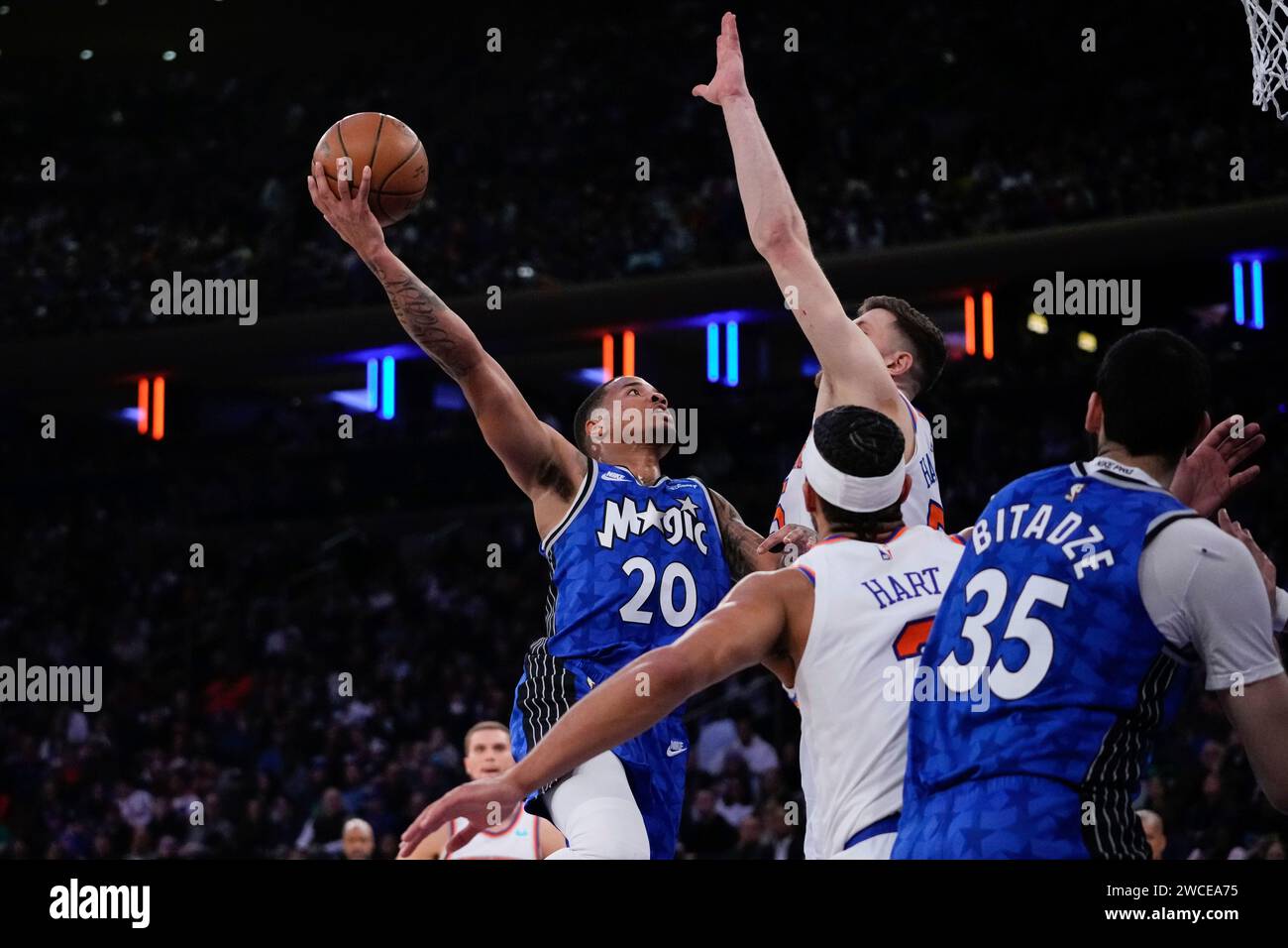 Orlando Magic's Markelle Fultz (20) looks to shoot over New York Knicks ...