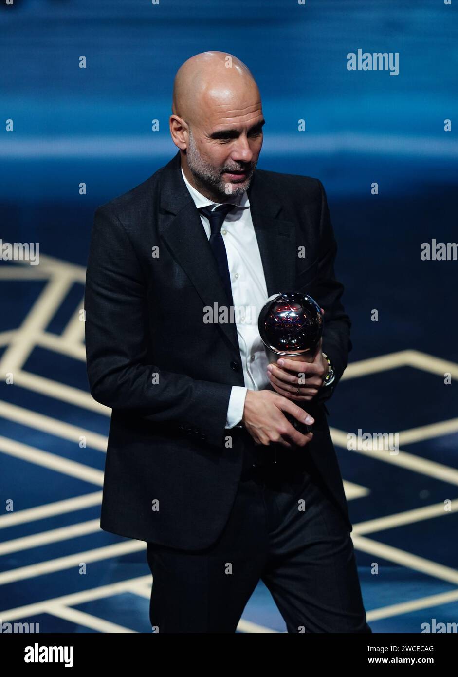 Pep Guardiola on stage with his trophy at the end of the show, during ...