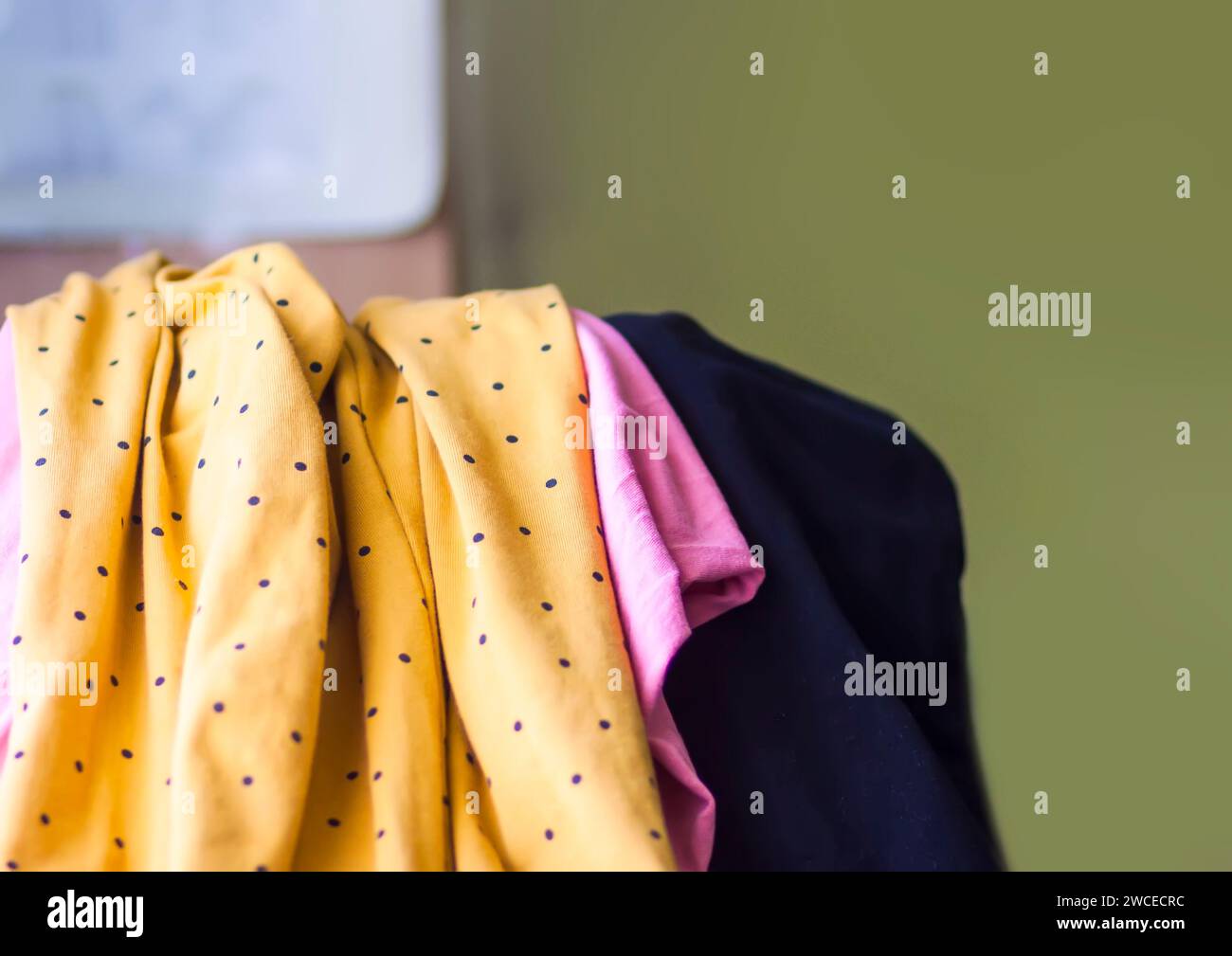 Unfolded clothes hi-res stock photography and images - Alamy