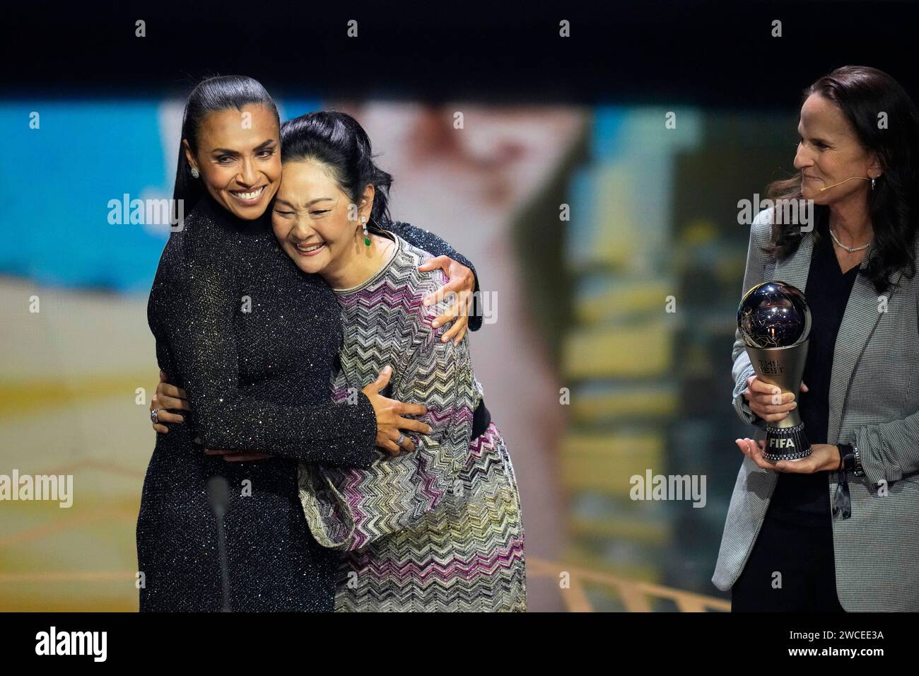 Brazil's soccer player Marta, left, accepts the FIFA Special award for ...