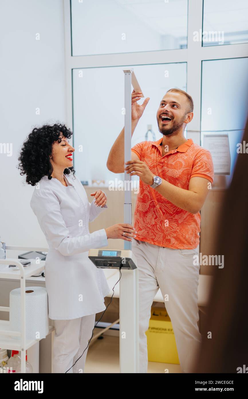 Experienced Doctor and Patient Smiling During Medical Examination in ...