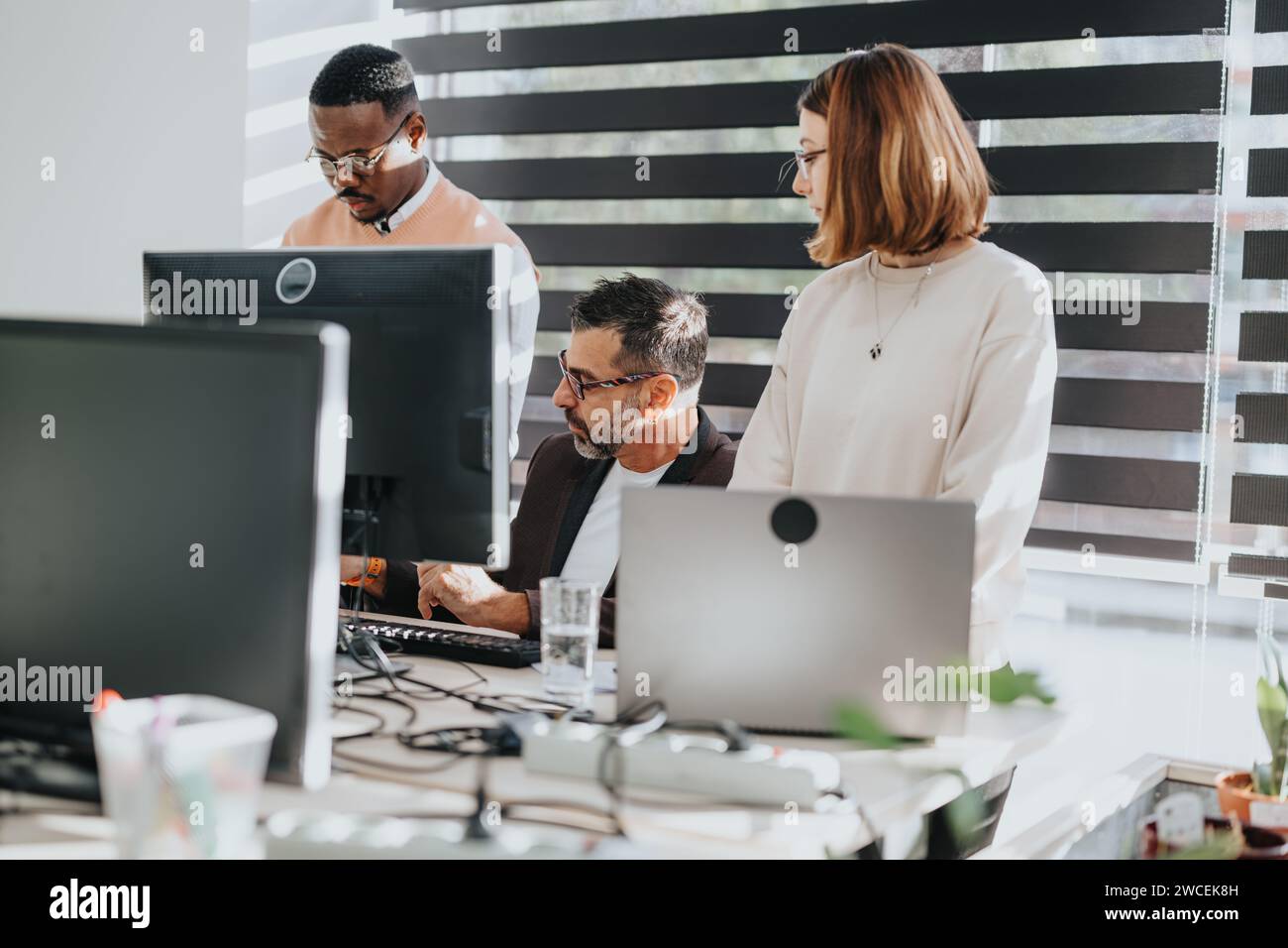 Diverse professionals collaborate, analyze data, and strategize for business growth. Successful ...