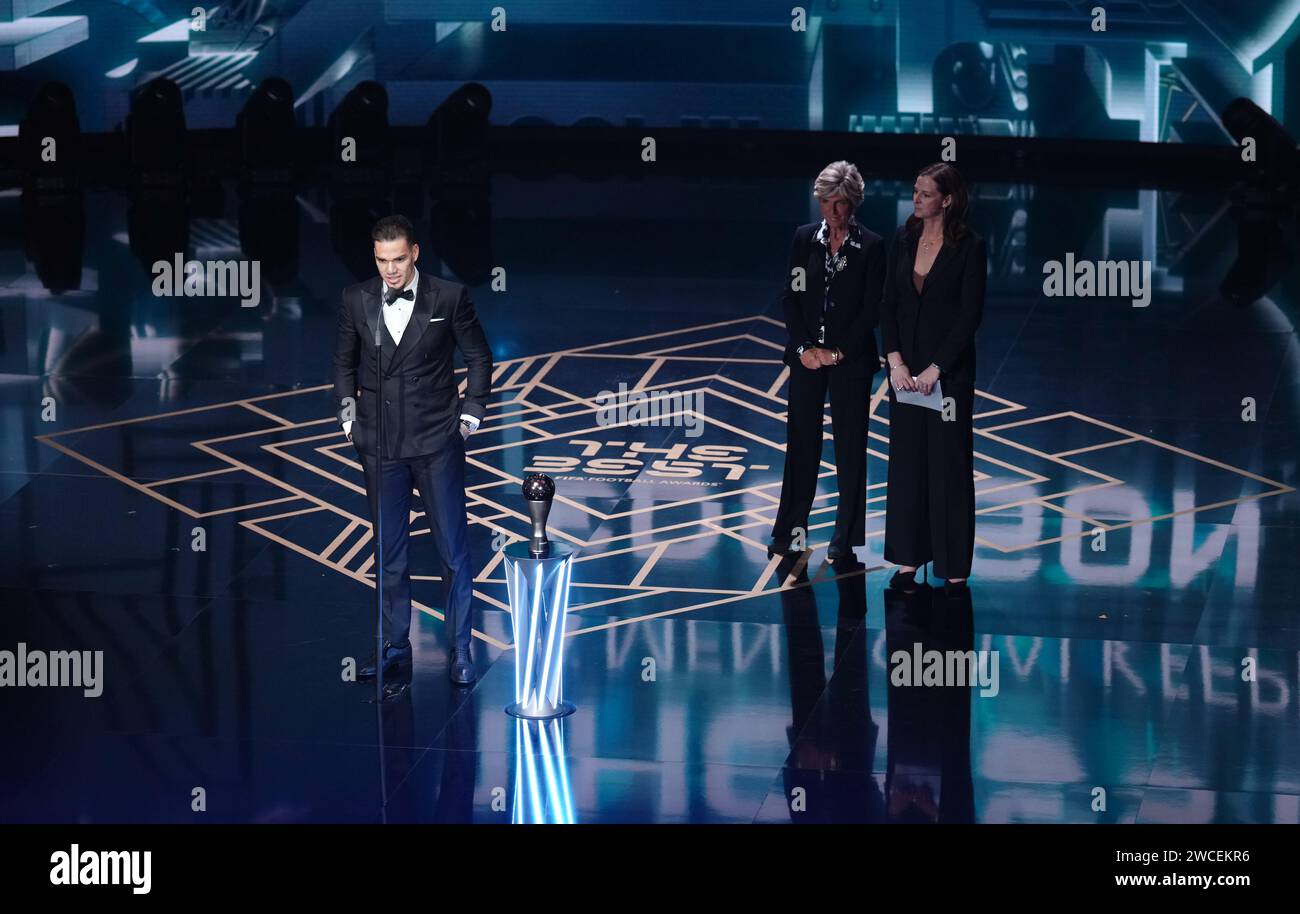 Ederson on stage after receiving the award for The Best Men's ...