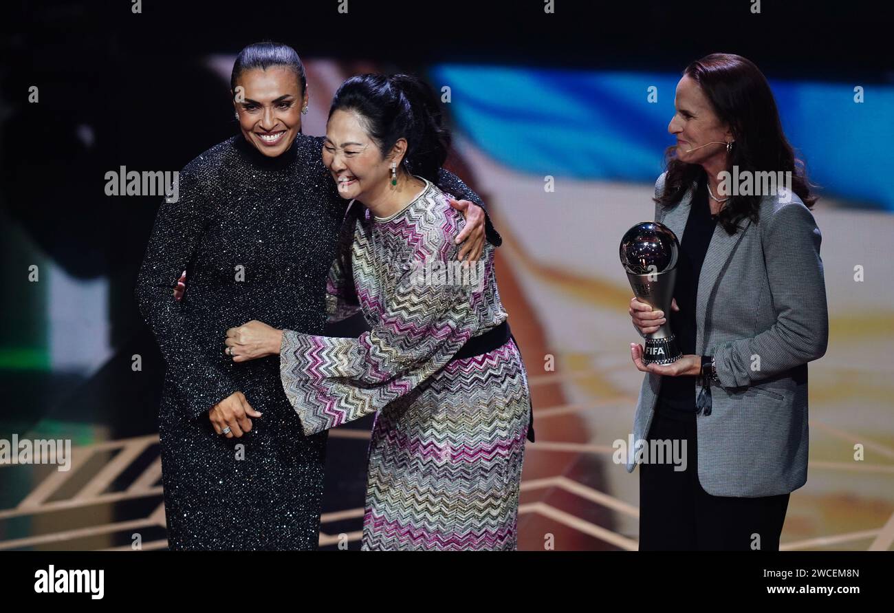 Former Brazilian player Marta (left) on stage after receiving a special ...