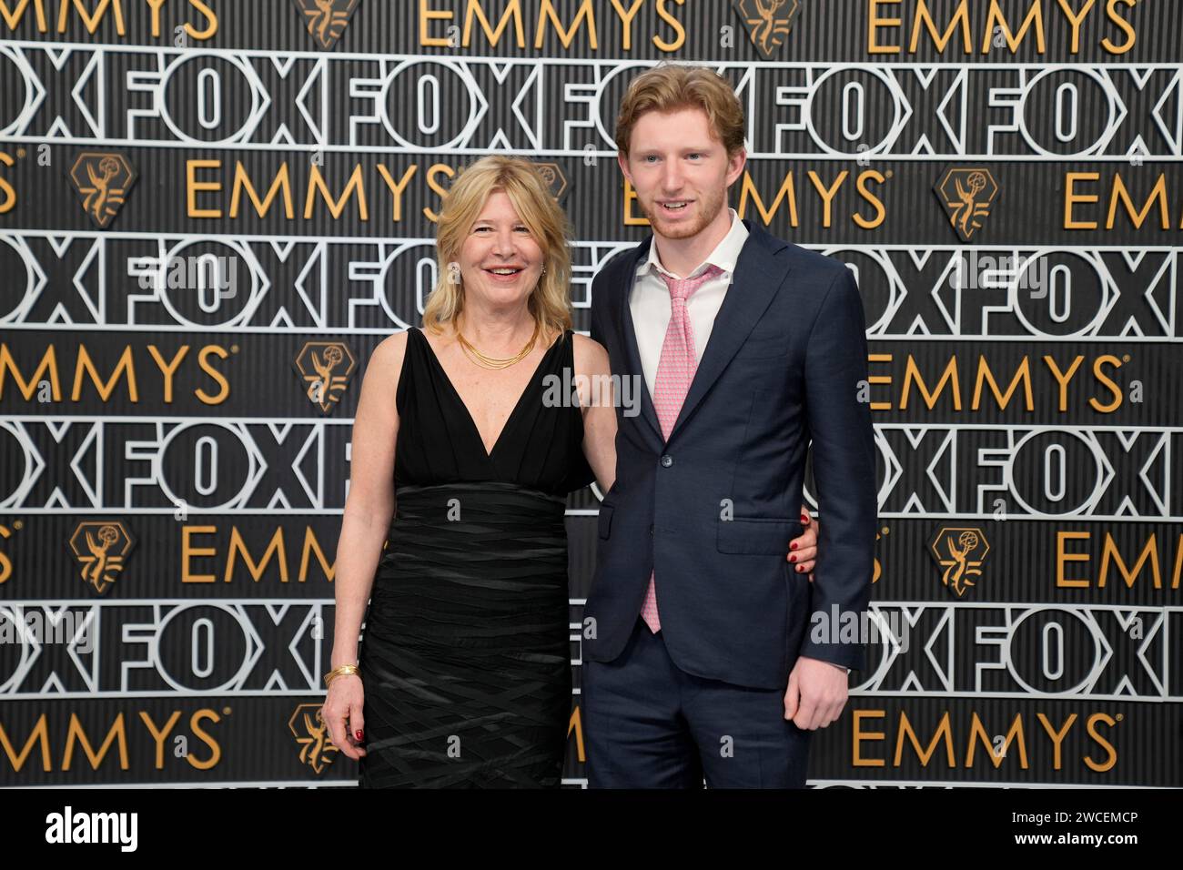 Diana Schmidt, left, and Jake O'Brien arrive at the 75th Primetime Emmy ...