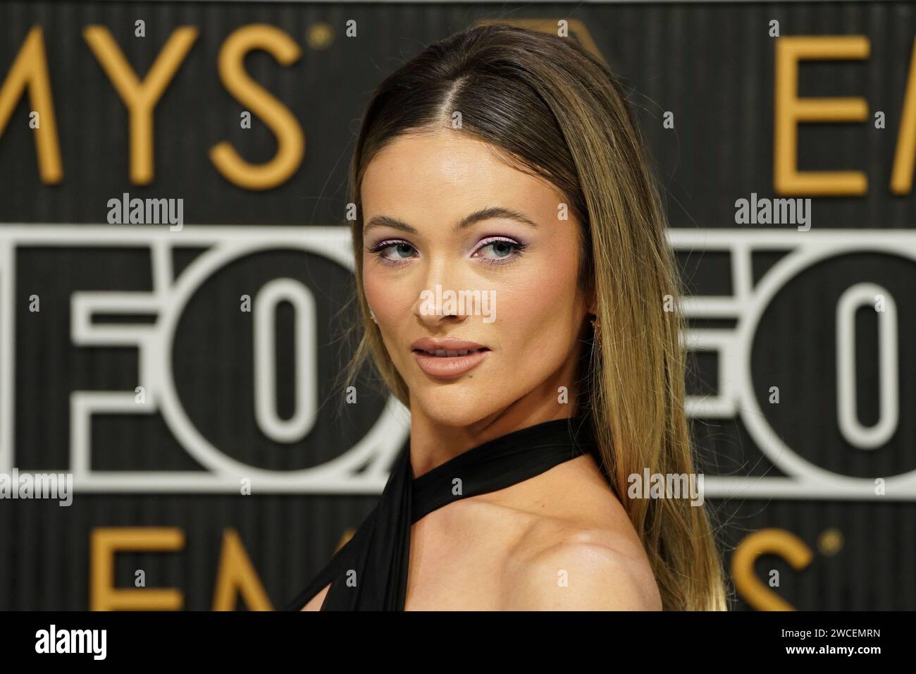 Elysée Sanvillé poses for a Red Carpet portrait at the 75th Emmy Awards ...