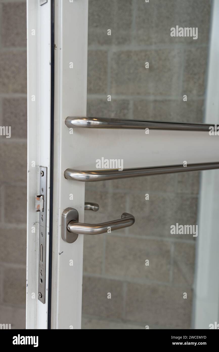 Transparent glass door . Door with aluminum frame and stainless steel ...