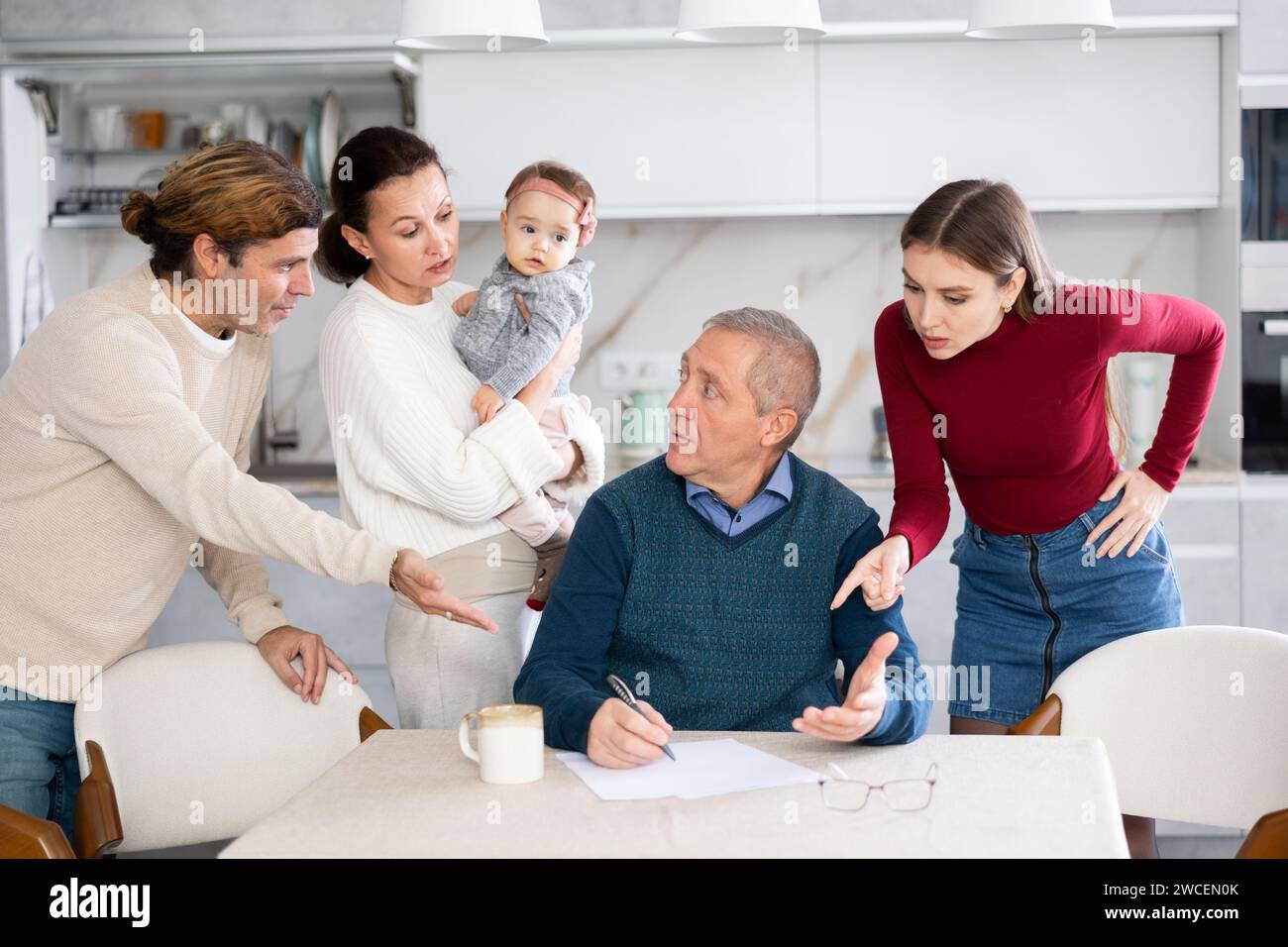 Family members discussing inheritance Stock Photo - Alamy