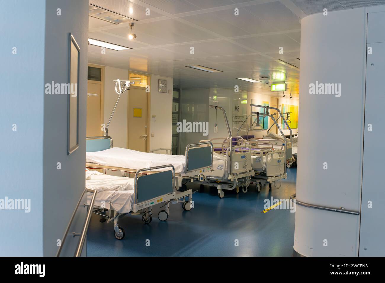 Abstracted perspective background of empty stretcher gurney beds at the ...