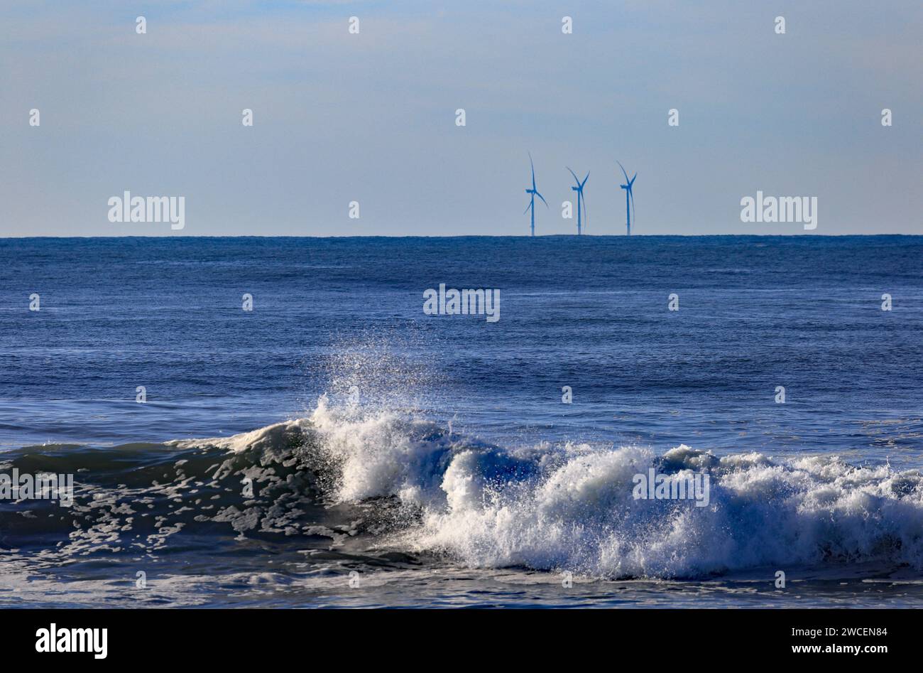 Darque, Portugal - January 15, 2024: Waves crashing on an ocean beach ...