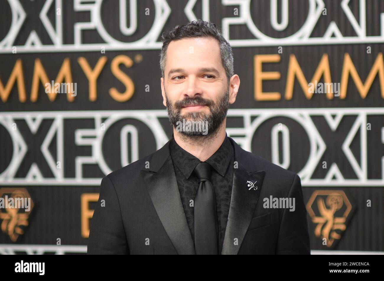 Neil Druckmann arrives at the 75th Primetime Emmy Awards on Monday, Jan ...