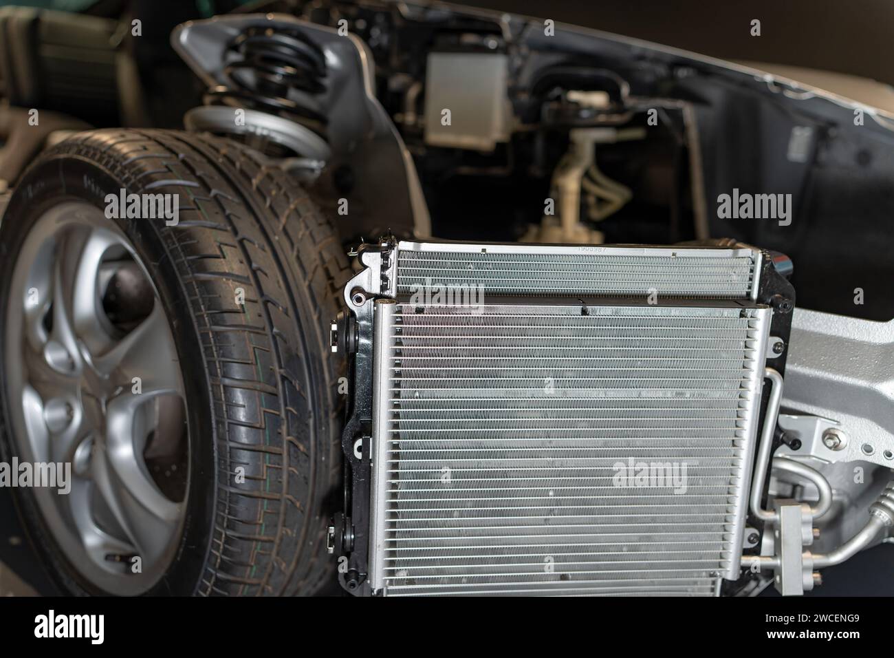 A sports car under repair. The structure of the car in close-up. The ...
