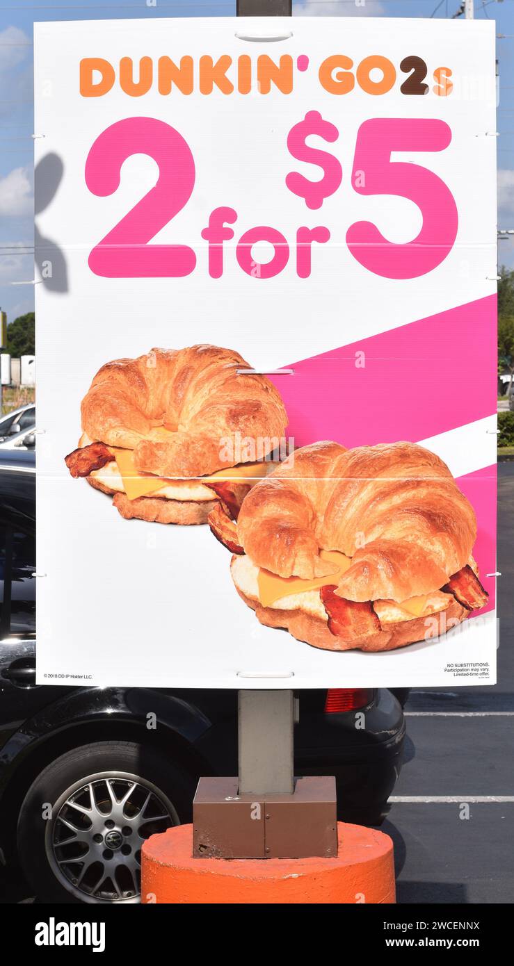 Dunkin' Go2s sign outside a Dunkin' Donut store in Florida Stock Photo ...