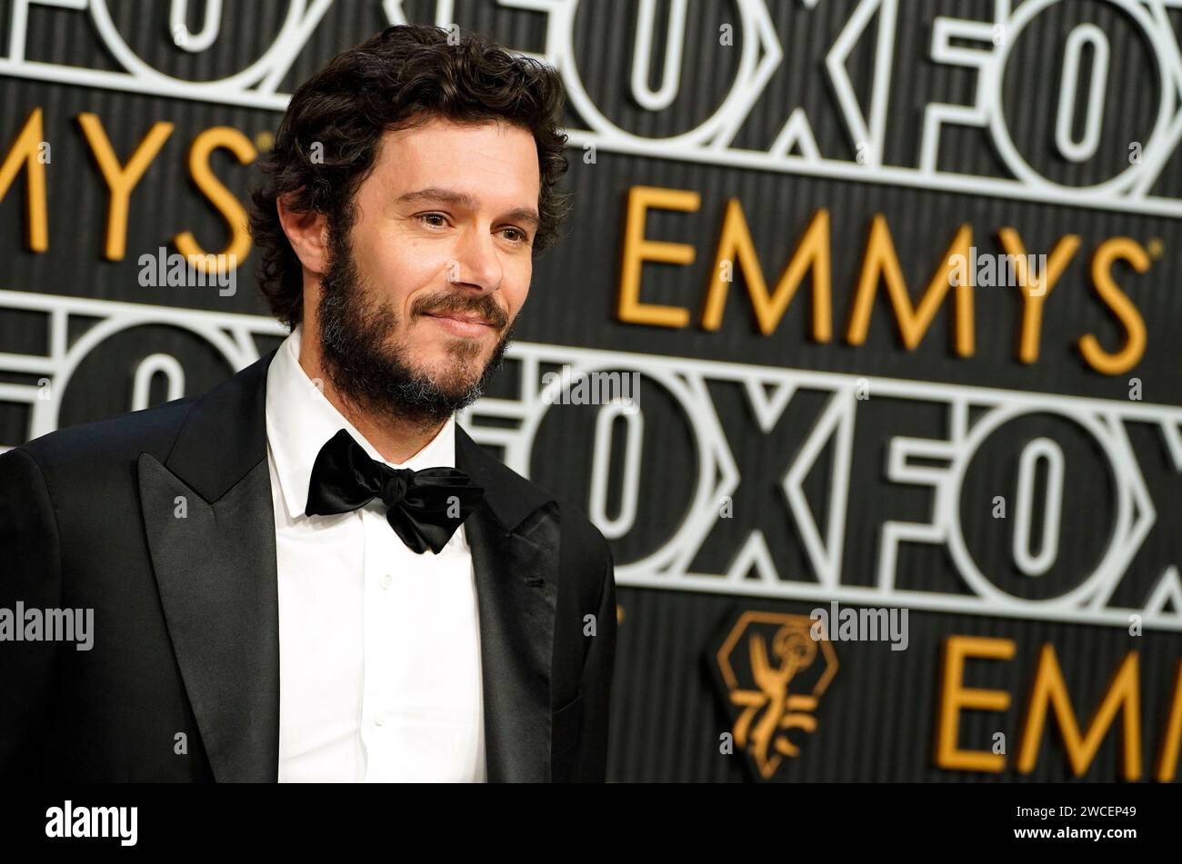 Adam Brody poses for a Red Carpet portrait at the 75th Emmy Awards on ...