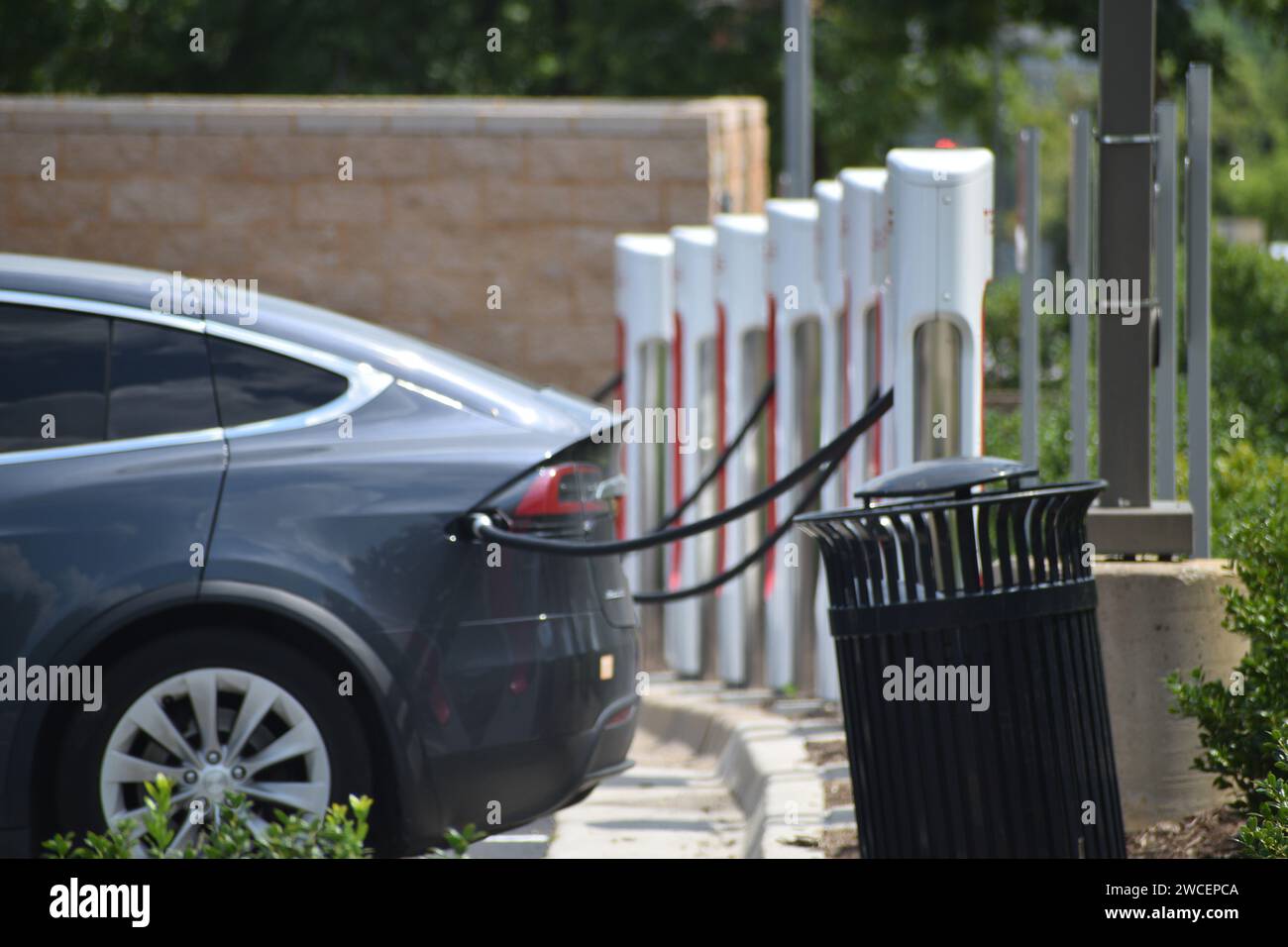 Tesla vehicles being charged at a Tesla charging station in Southlake ...