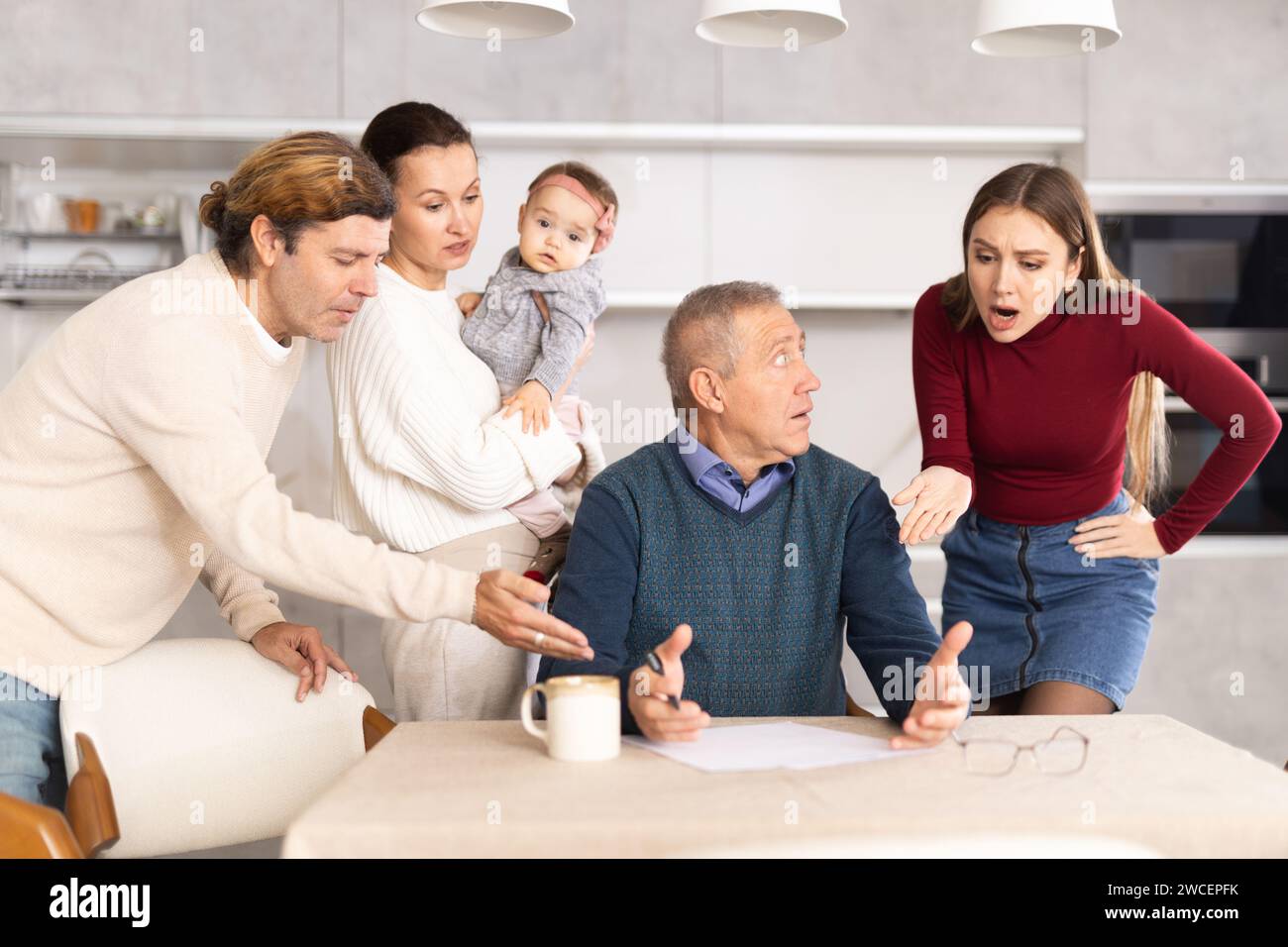 Family members discussing inheritance Stock Photo - Alamy