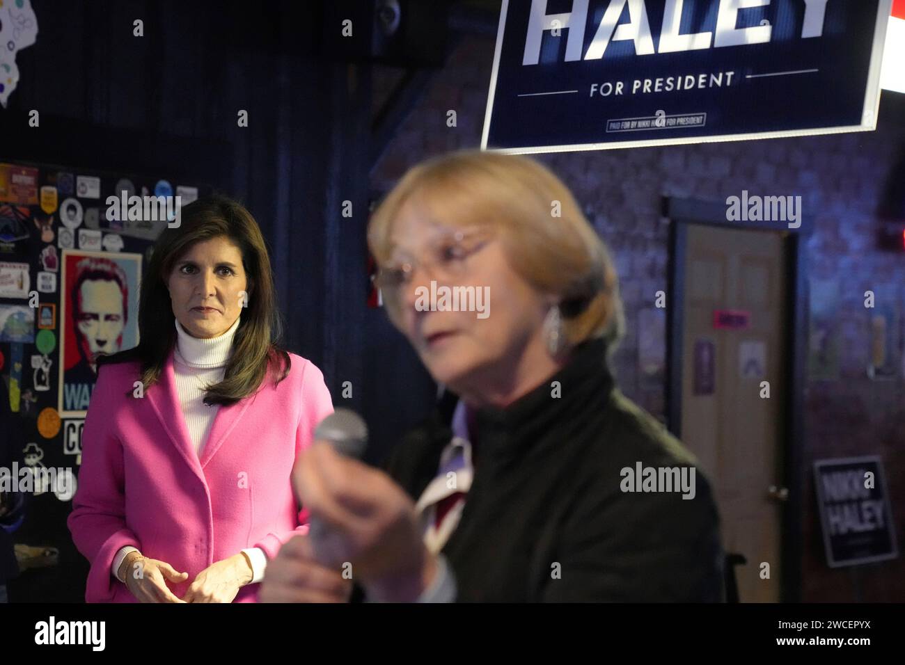 GOP presidential hopeful Nikki Haley, left, looks on as Marlys Popma ...