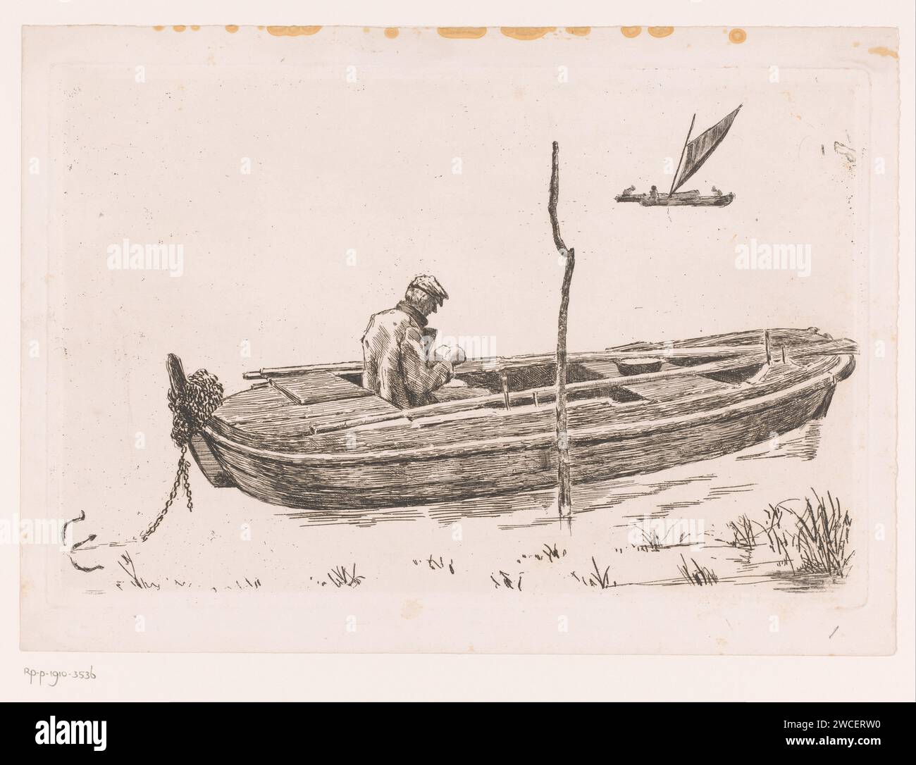 Rowing boat for anchor in open water and a sailboat in the background ...