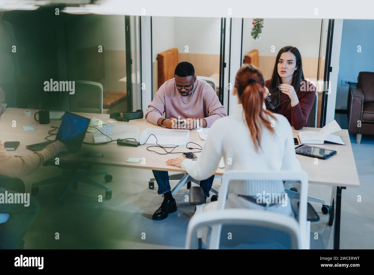 Business people working on completion of a project, demonstrating ...