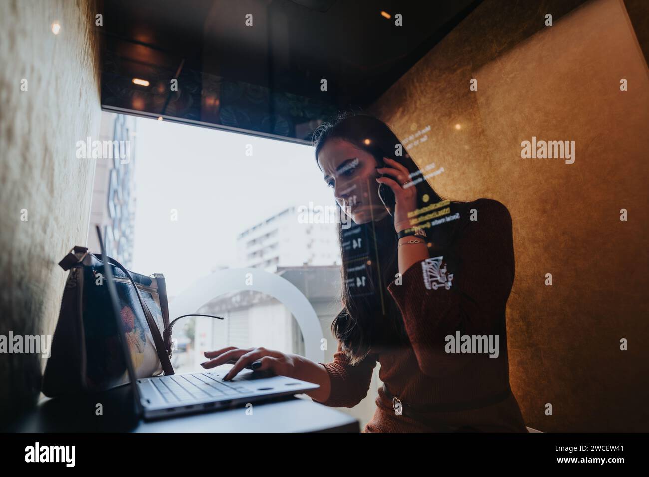 Successful Businesswoman Negotiating Project Costs in Office Phone ...