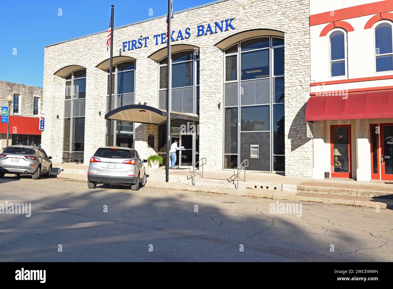 Customer entering the First State Bank in downtown Lampasas Texas on a ...