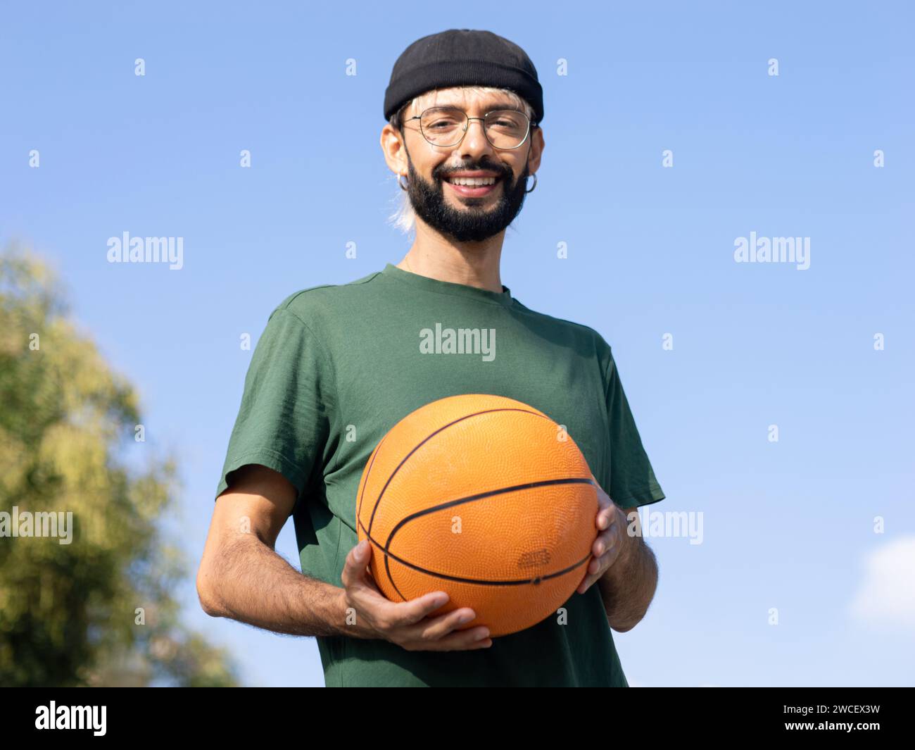 Handsome millennial player in hi-res stock photography and images - Alamy