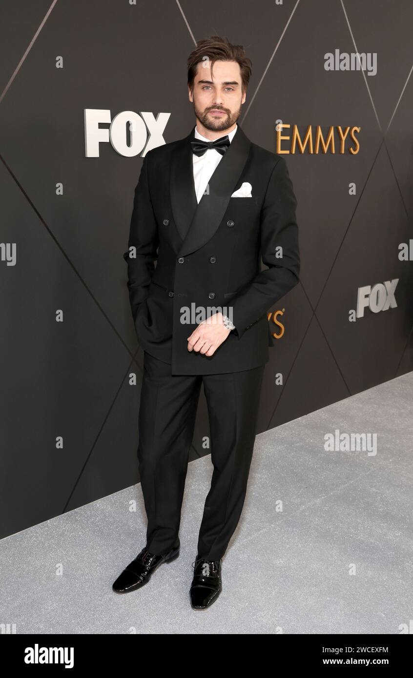 Stephen Manas walks the red carpet at the 75th Emmy Awards on Monday ...