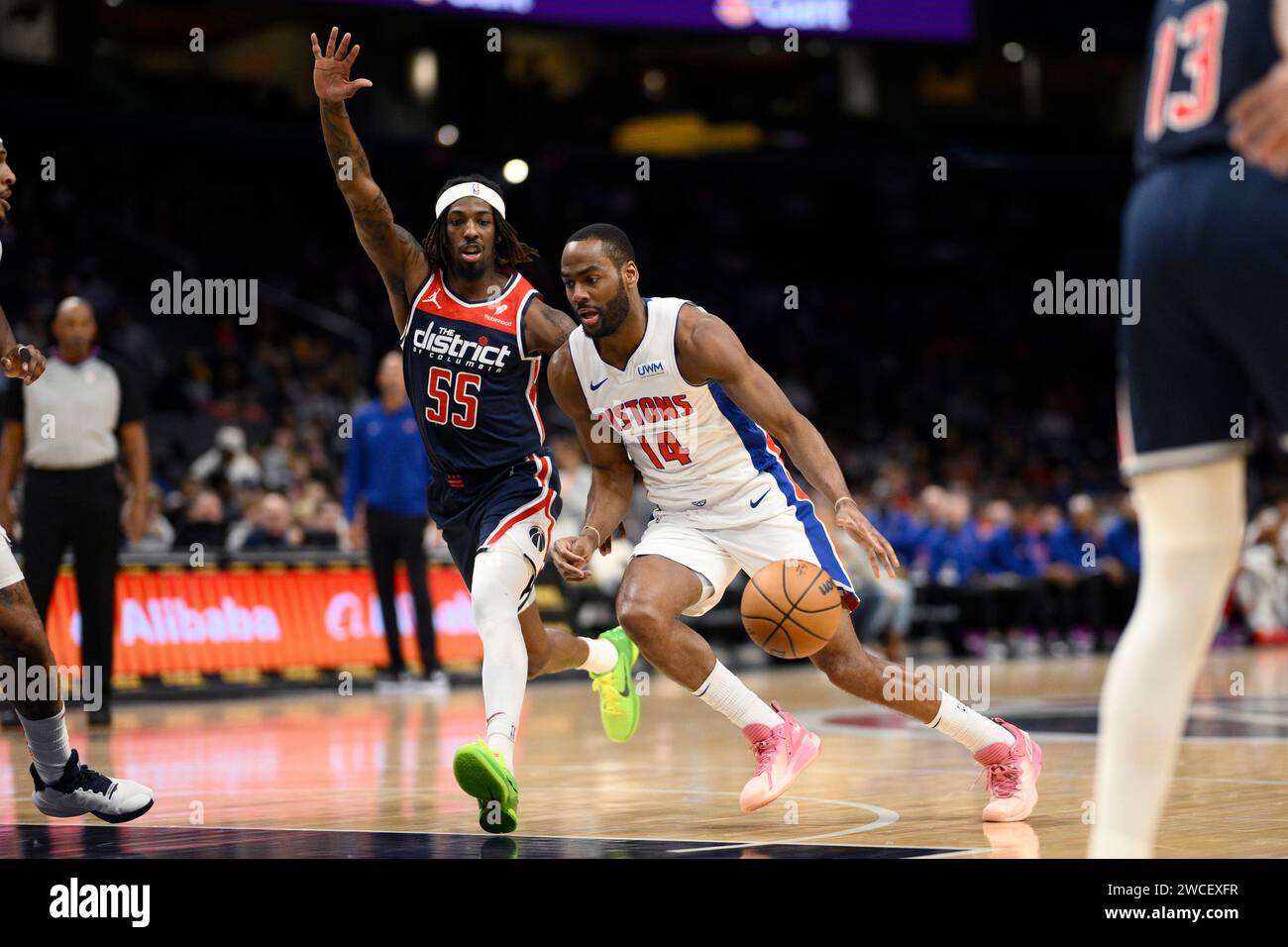Detroit Pistons guard Alec Burks (14) drives to the basket against Washington Wizards guard ...