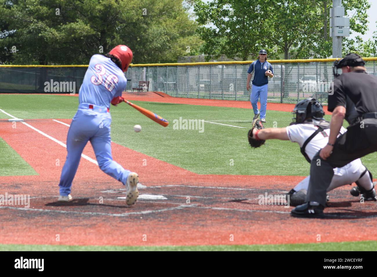 A college baseball player at bat against Dallas Christian College ...