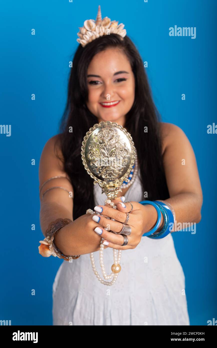 Portrait of beautiful black-haired woman wearing white clothing ...