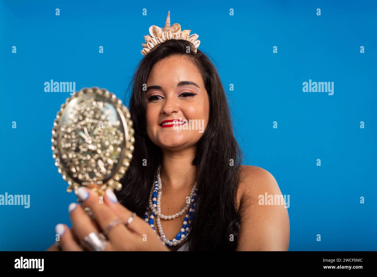 Portrait of beautiful black-haired woman wearing white clothing ...