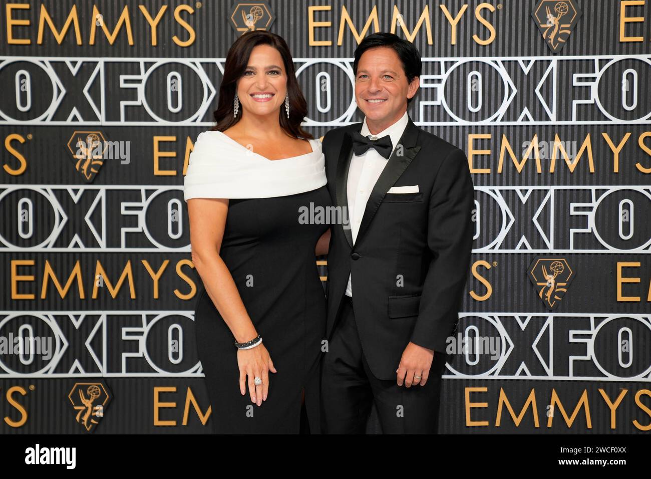 Lauren Levy Neustadter, left, and Scott Neustadter arrive at the 75th ...