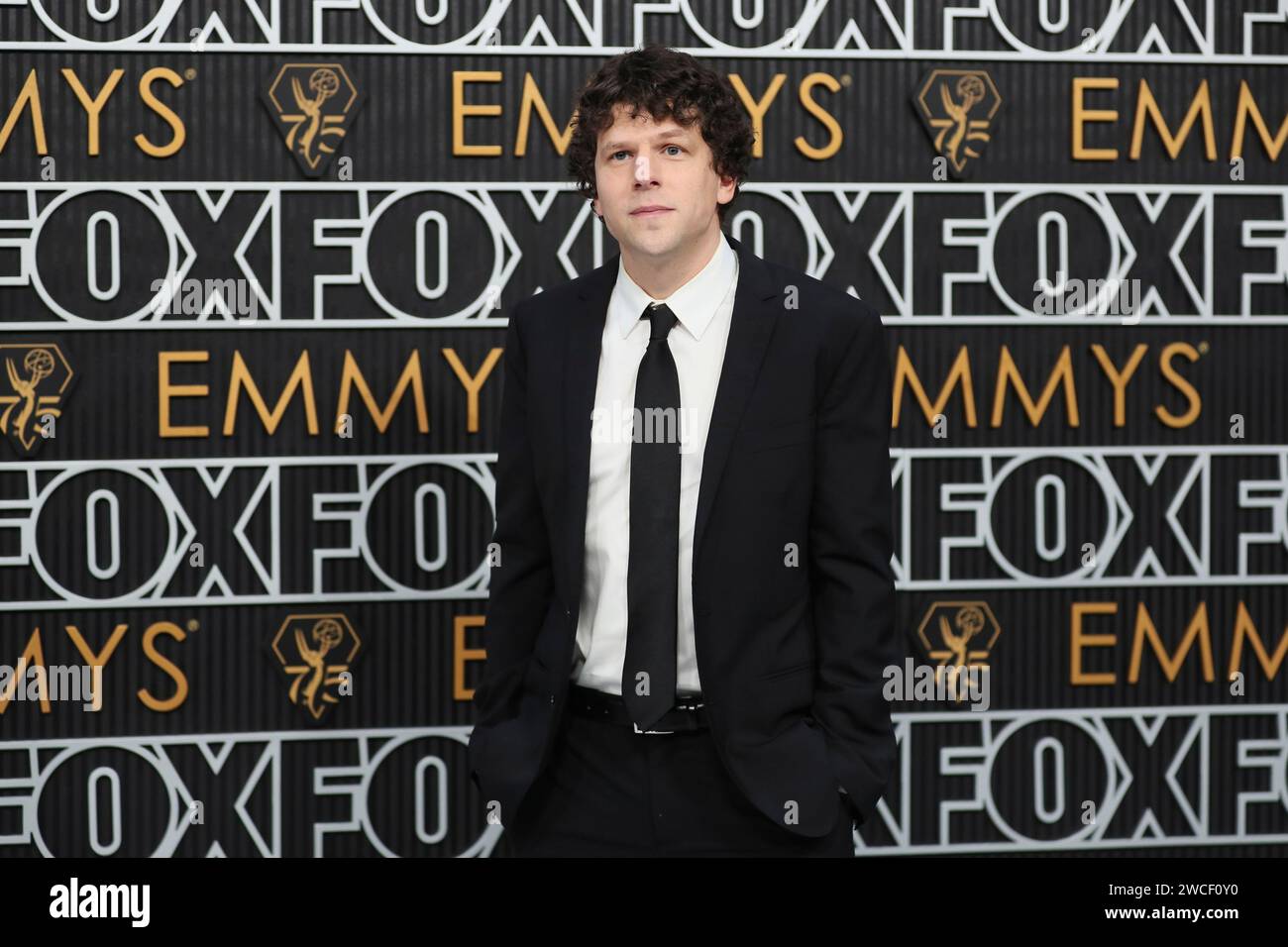 Jesse Eisenberg poses for a Red Carpet portrait at the 75th Emmy Awards ...