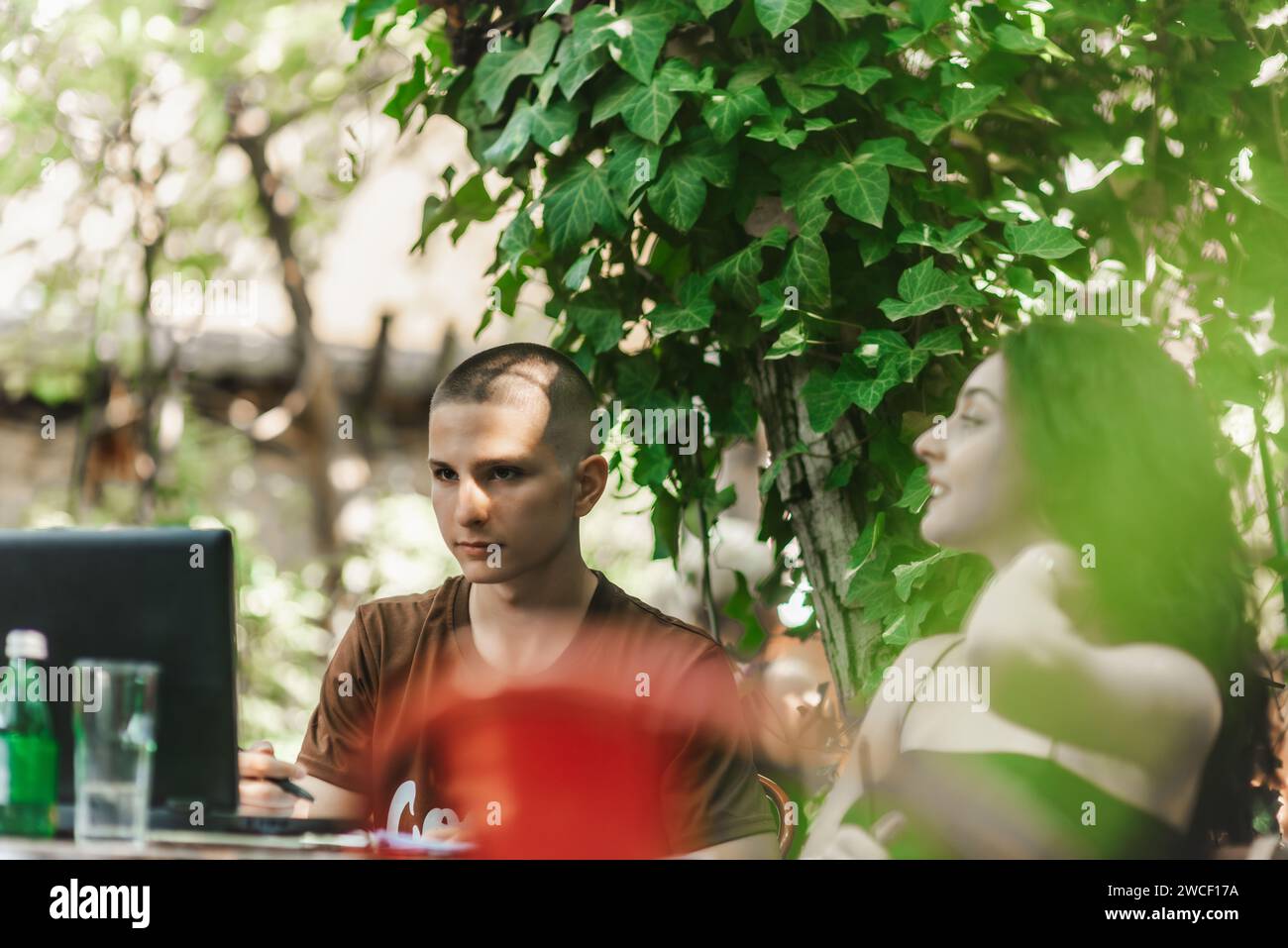 Classmates helping each other hi-res stock photography and images - Alamy