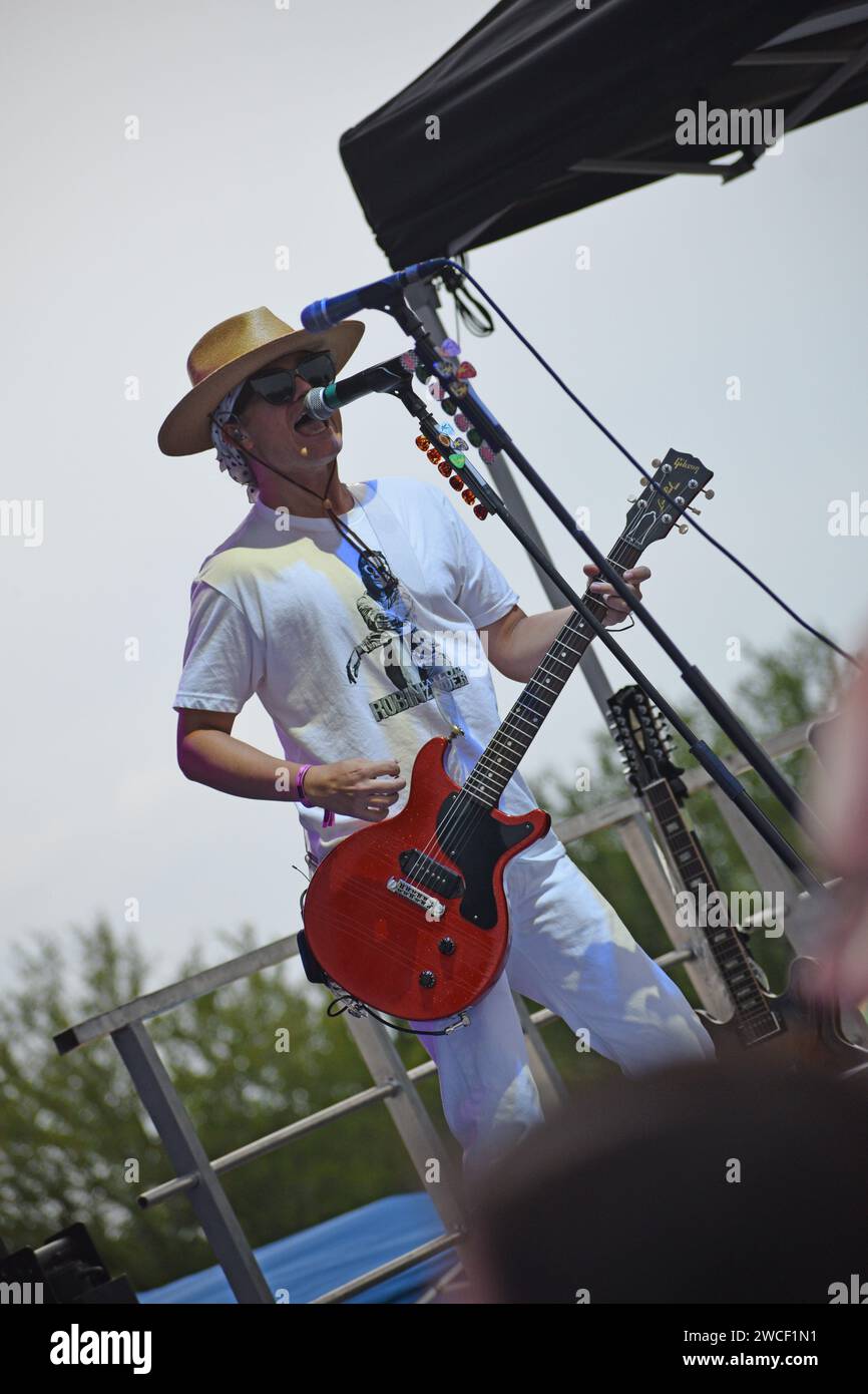 Cheap Trick performs in Sherman Texas, during what would become a rain ...