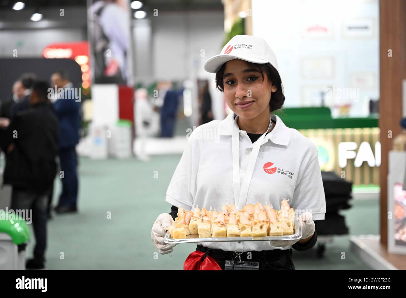 Hawalli, Kuwait. 15th Jan, 2024. An exhibitor displays food during the ...