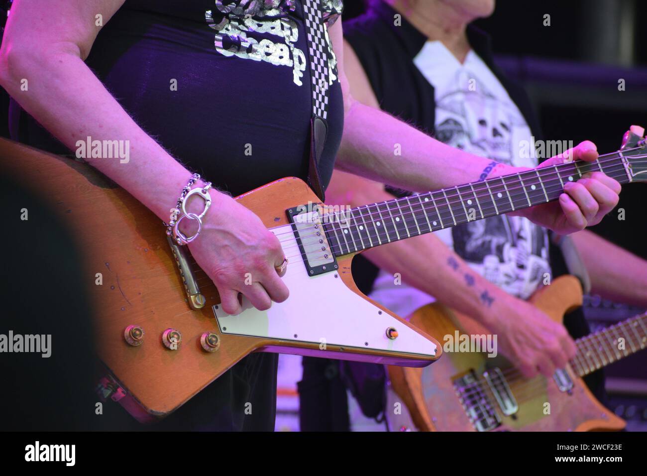 Cheap Trick performs in Sherman Texas, during what would become a rain ...