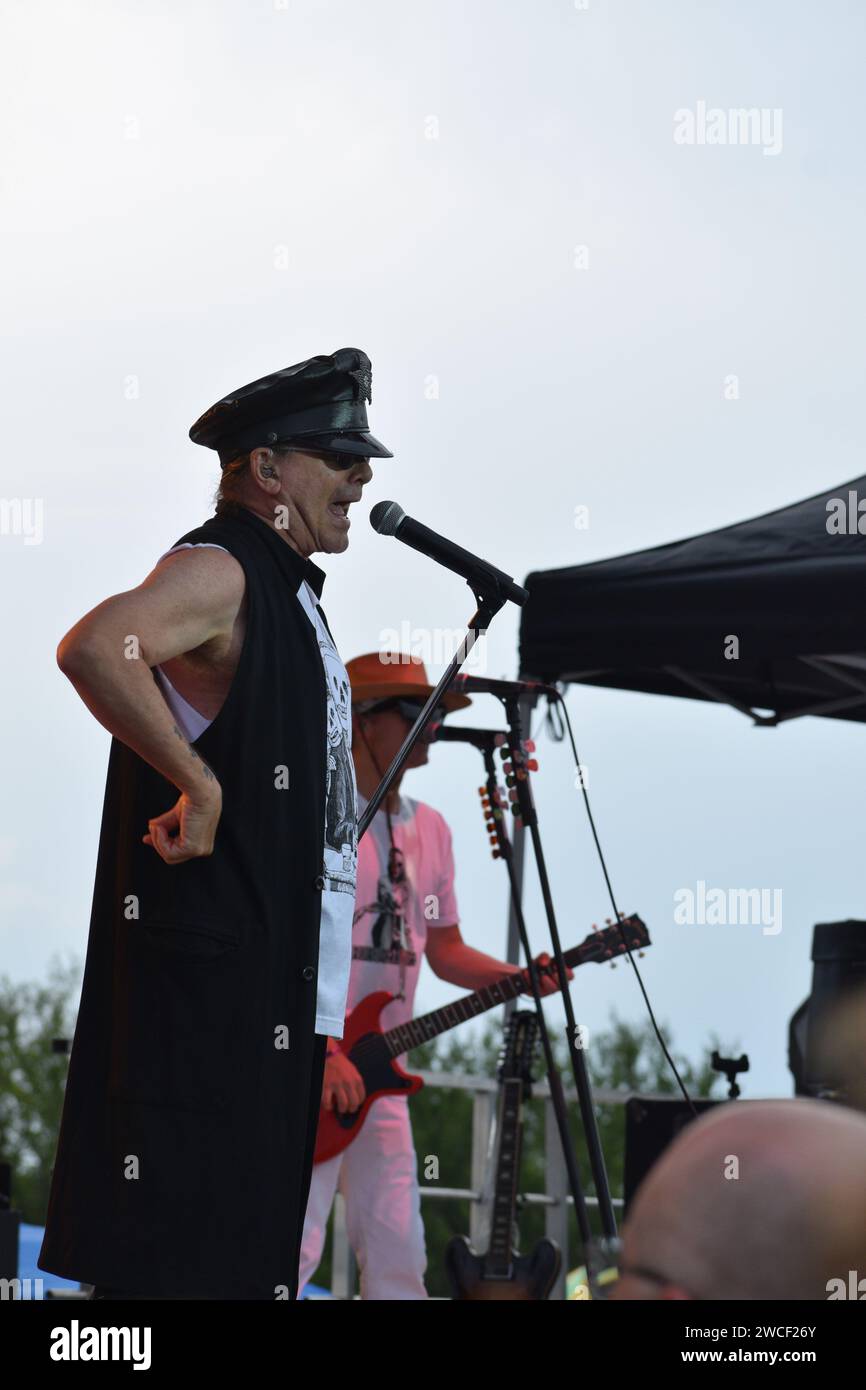 Cheap Trick performs in Sherman Texas, during what would become a rain ...