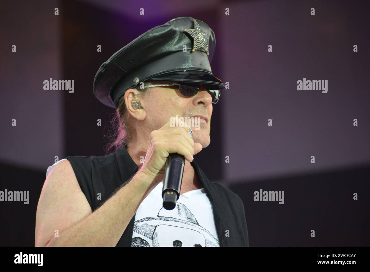 Cheap Trick performs in Sherman Texas, during what would become a rain ...