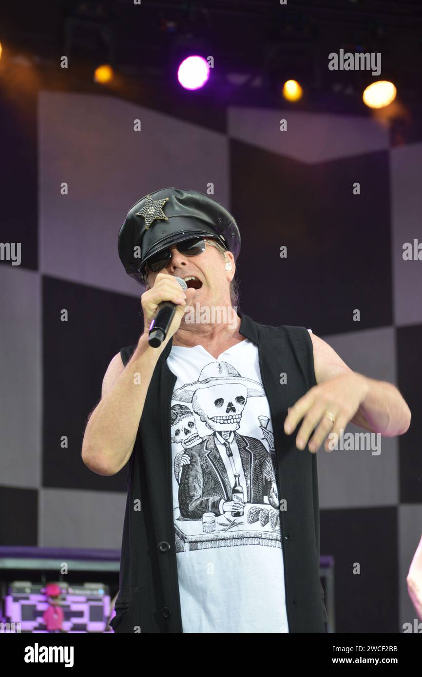 Cheap Trick performs in Sherman Texas, during what would become a rain ...