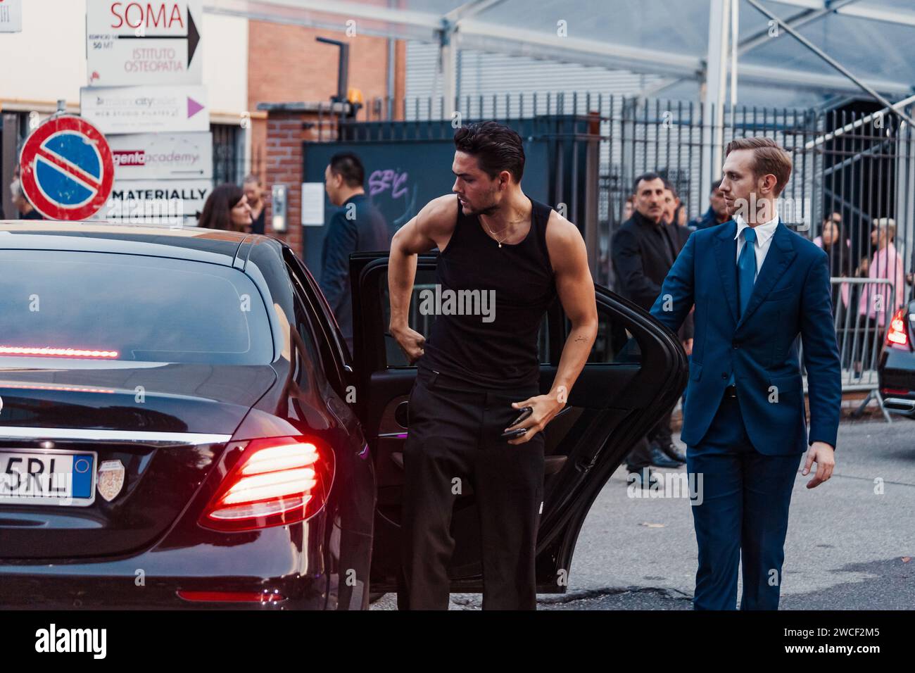 Guests outside Versace show during Milan Fashion Week Womenswear Spring ...
