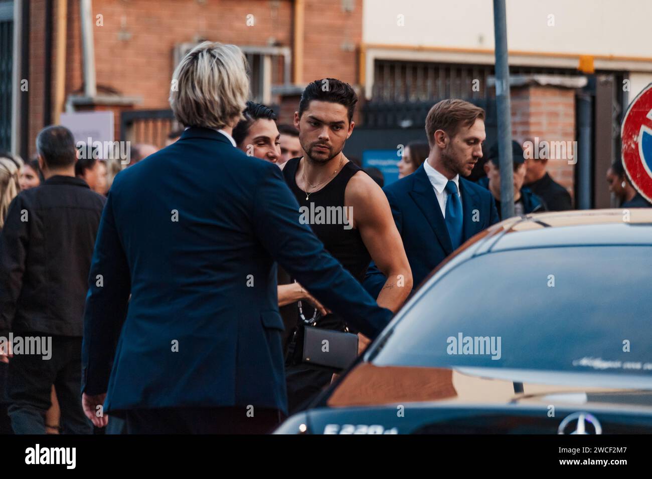 Guests outside Versace show during Milan Fashion Week Womenswear Spring ...